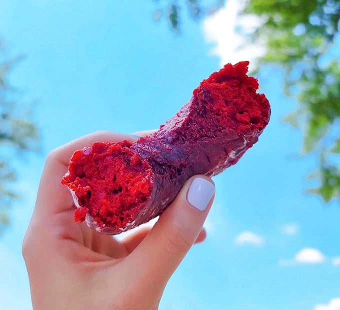 Red velvet perfection! This isn't just a donut; it's a ruby-hued masterpiece that would make even the Wizard of Oz jealous.