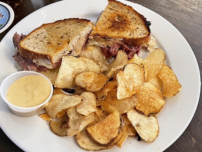 The Reuben that launched a thousand cravings! Piled high with corned beef and sauerkraut, it's a sandwich that demands both hands and your full attention.
