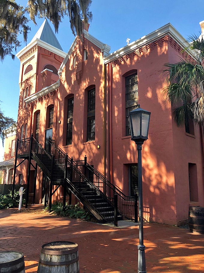 Step right up to the big house! This crimson castle's got more charm than your average lockup.