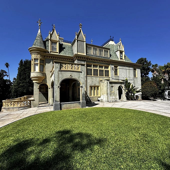 Honey, I shrunk the ch&acirc;teau! This side view showcases the mansion's charming blend of European grandeur and California cool. No passport required for this French getaway.