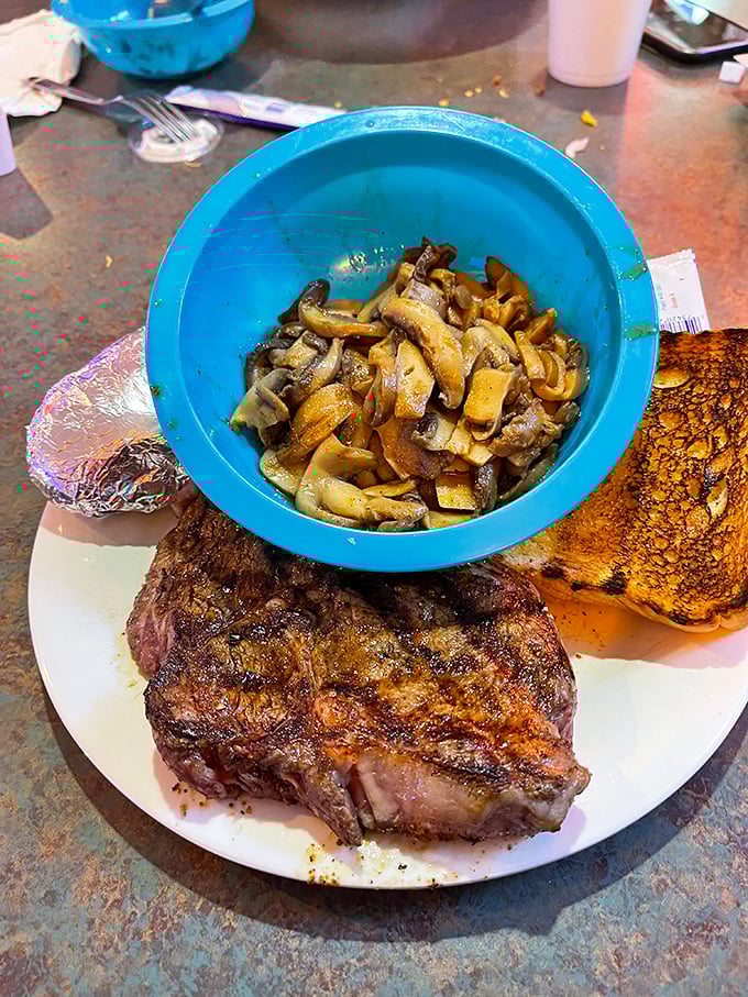 Steak so good, it deserves its own blue bowl throne. Those mushrooms? The perfect royal attendants.