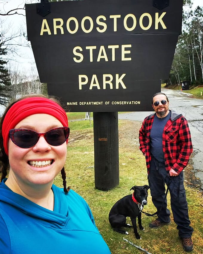 Welcome to the club! These happy campers have found the secret handshake to Aroostook's natural wonders. Smiles and wagging tails included.