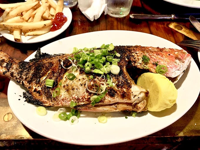 Holy mackerel! This whole snapper looks like it swam straight from the Mediterranean onto your plate. A Greek tragedy? More like a flavor odyssey!