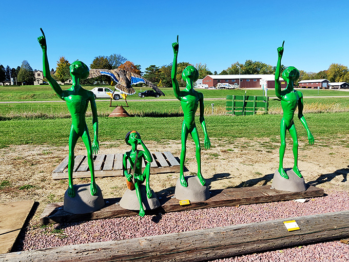 ET, phone Minnesota! These jolly green visitors look like they've crash-landed into a quirky sci-fi sitcom set in the heartland.