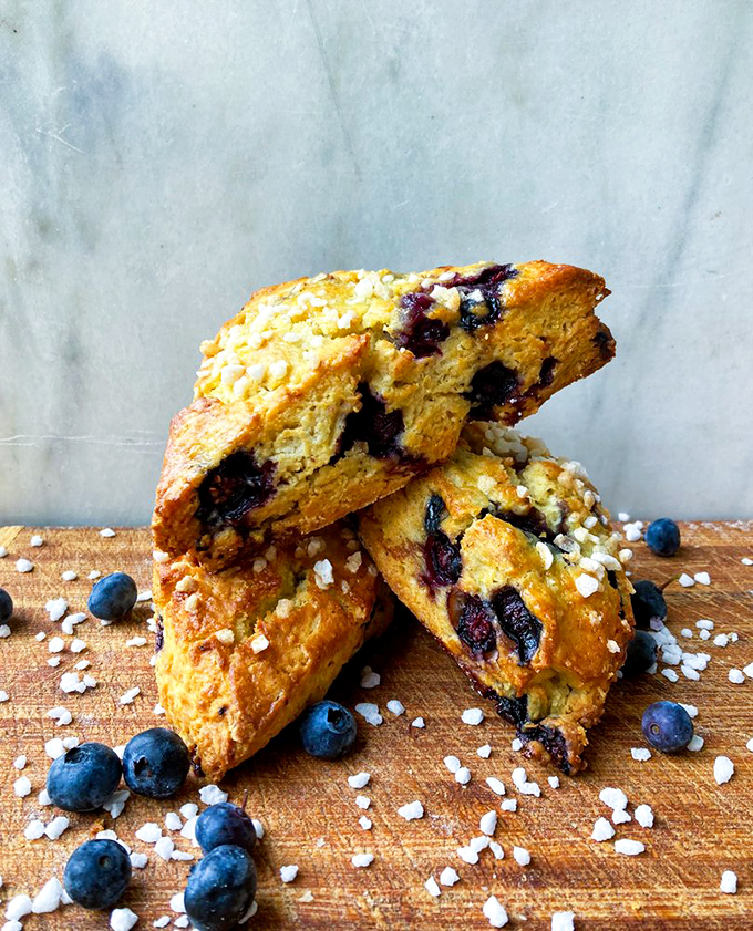 Blueberry scones that could make a Brit weep with joy! These golden beauties are studded with berries like sapphires in a pastry crown.