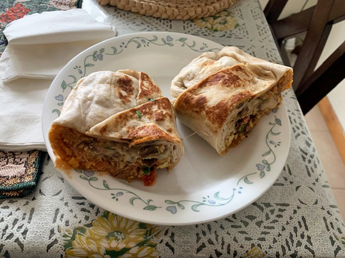 Breakfast of champions? More like breakfast of flavor superheroes! This burrito is ready to save your morning from mundane meals.