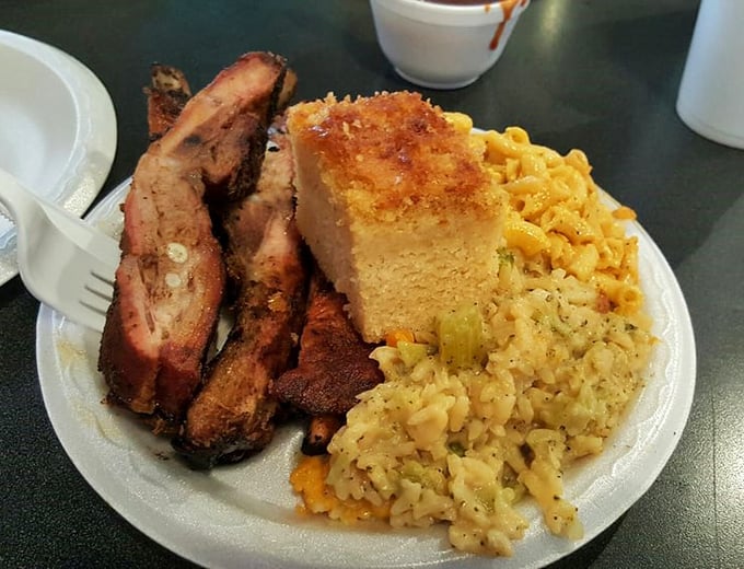 Behold, the holy trinity of Southern cuisine: ribs, cornbread, and mac 'n' cheese. It's like a warm hug for your taste buds.