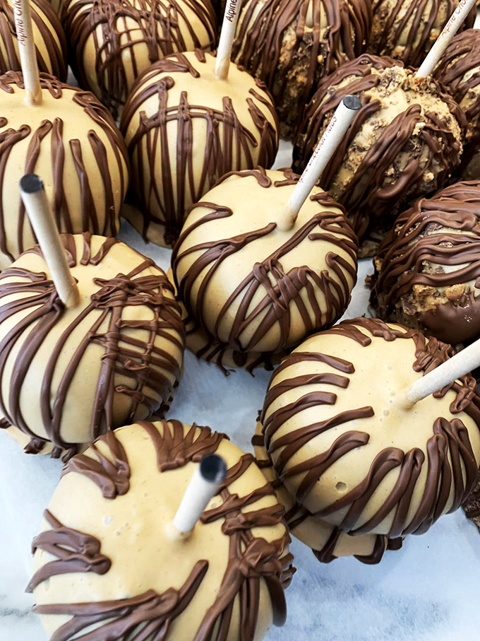 Caramel apples on steroids! These gourmet treats make your childhood fairground memories look like amateur hour.