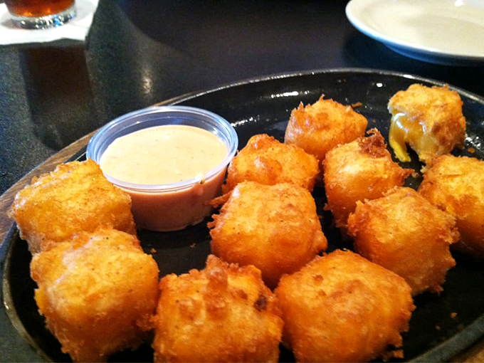 Behold, the golden nuggets of joy! These cheese curds are so perfectly crispy, they could make a Wisconsinite weep with envy.