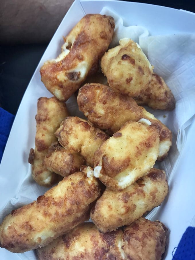 Behold the holy grail of Wisconsin cuisine! These cheese curds are so fresh, they might just squeak "hello" when you bite into them.