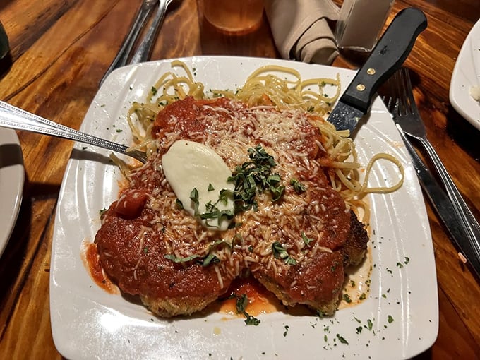 Mama mia, that's a spicy meatball! This chicken parmesan could make even the Godfather forget about his troubles for a moment.