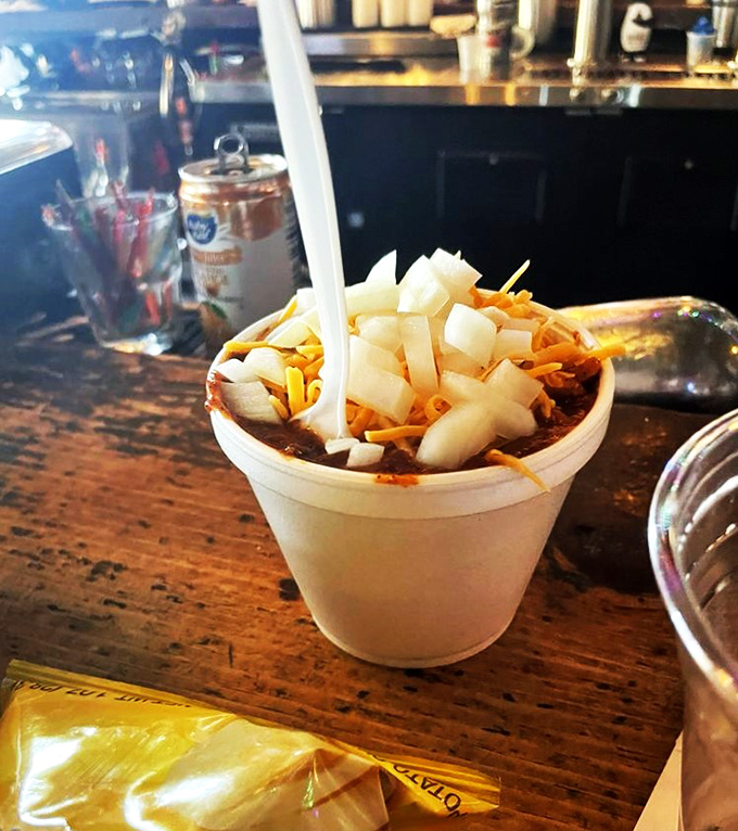 Chili so good, it'll make you forget about your winter blues! Topped with cheese and onions, this hearty bowl is like a warm hug for your insides.