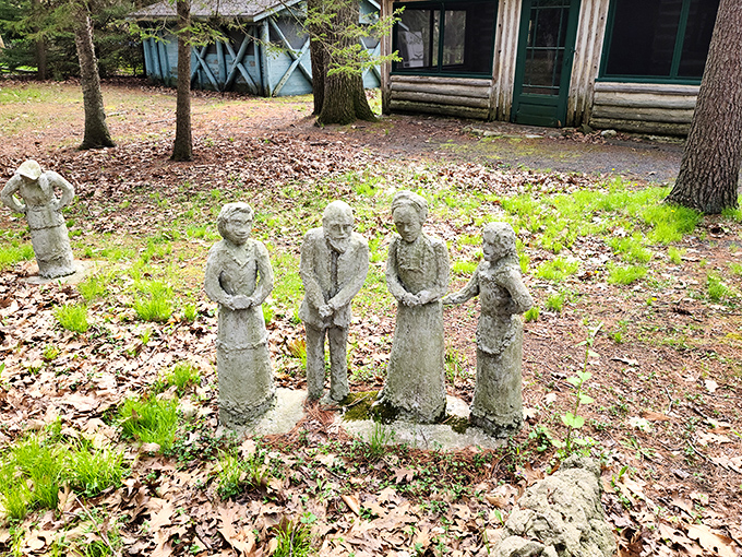 "We're not stoned, we're petrified!" These concrete folks look like they've just heard the world's most shocking gossip. Soap opera, anyone?