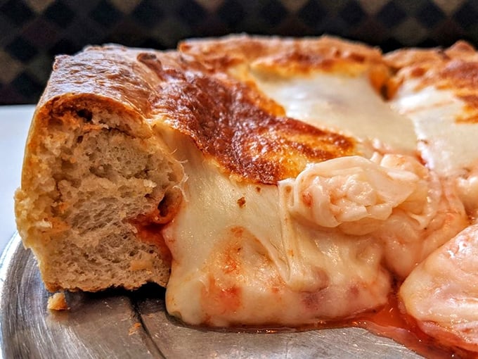 "Behold, the eighth wonder of the culinary world!" This deep dish pizza is a towering testament to Chicago's ingenuity, with layers that rival the city's skyscrapers.
