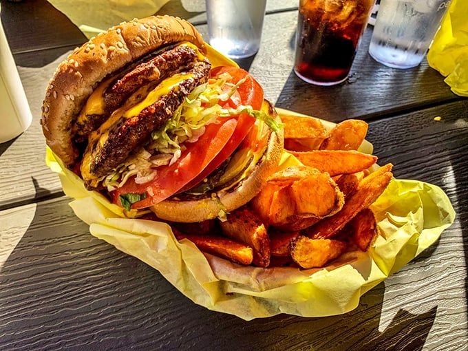 Holy moly, that's a handful! This double cheeseburger isn't just a meal, it's a delicious challenge to your jaw's elasticity.