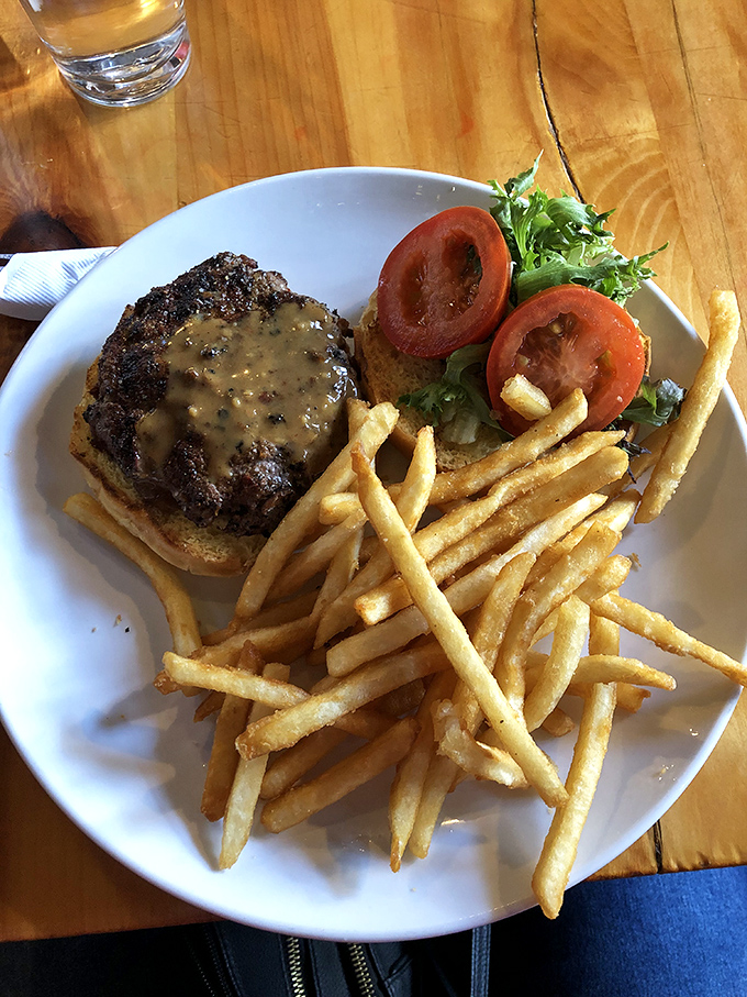 Meet the star of the show: the elk burger. It's not just a meal; it's a wilderness adventure for your taste buds!