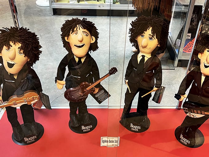 From "Love Me Do" to "Let It Be," this wall chronicles the Beatles' journey. It's like flipping through the world's coolest musical scrapbook.