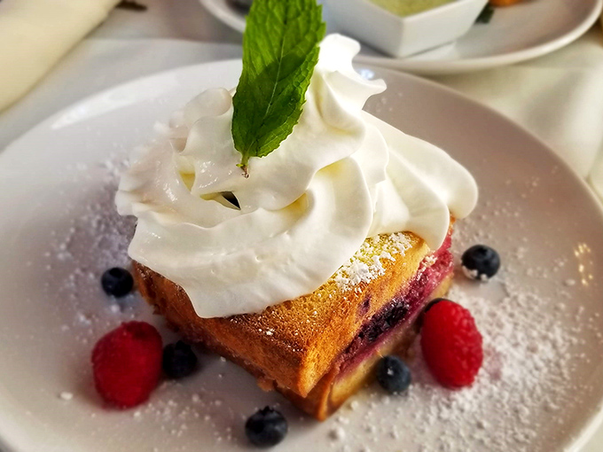 Breakfast or dessert? Why choose! This berry-studded French toast is a sweet symphony that would make even Marie Antoinette say, "Let them eat cake&hellip; for breakfast!"