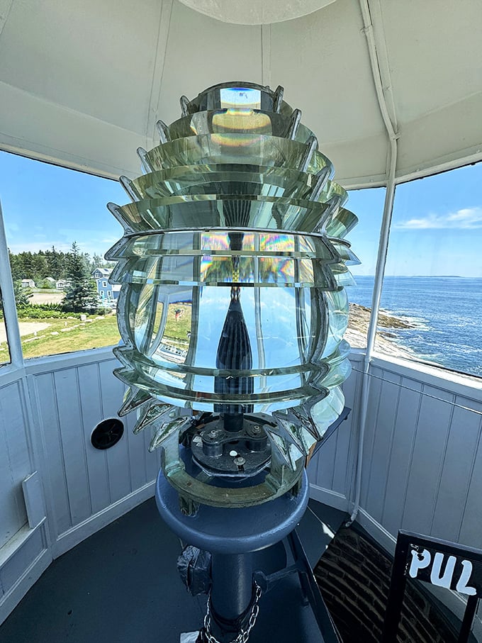 Behold the lighthouse's crown jewel: a Fresnel lens that's part scientific marvel, part work of art. It's the disco ball of maritime safety!