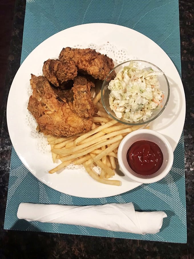 Crispy, juicy, and more tempting than a siren's song &ndash; Rossy's fried chicken is the stuff of legends. Paired with creamy coleslaw, it's a match made in comfort food heaven.