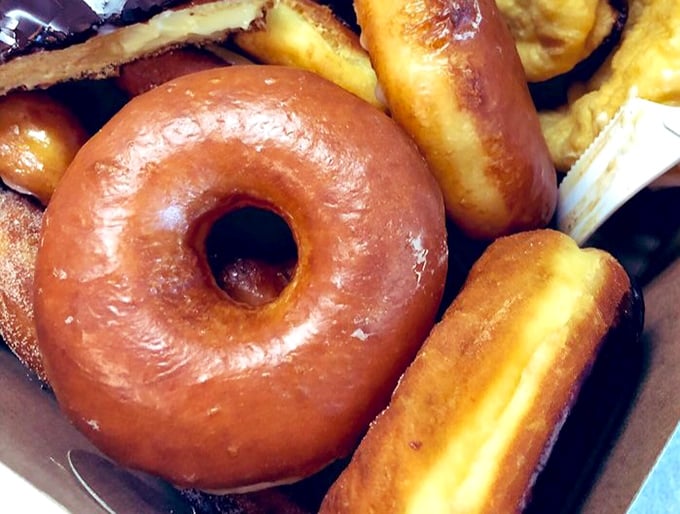 Behold, the holy grail of donuts! This classic glazed beauty is so perfect, it could make Homer Simpson weep with joy.