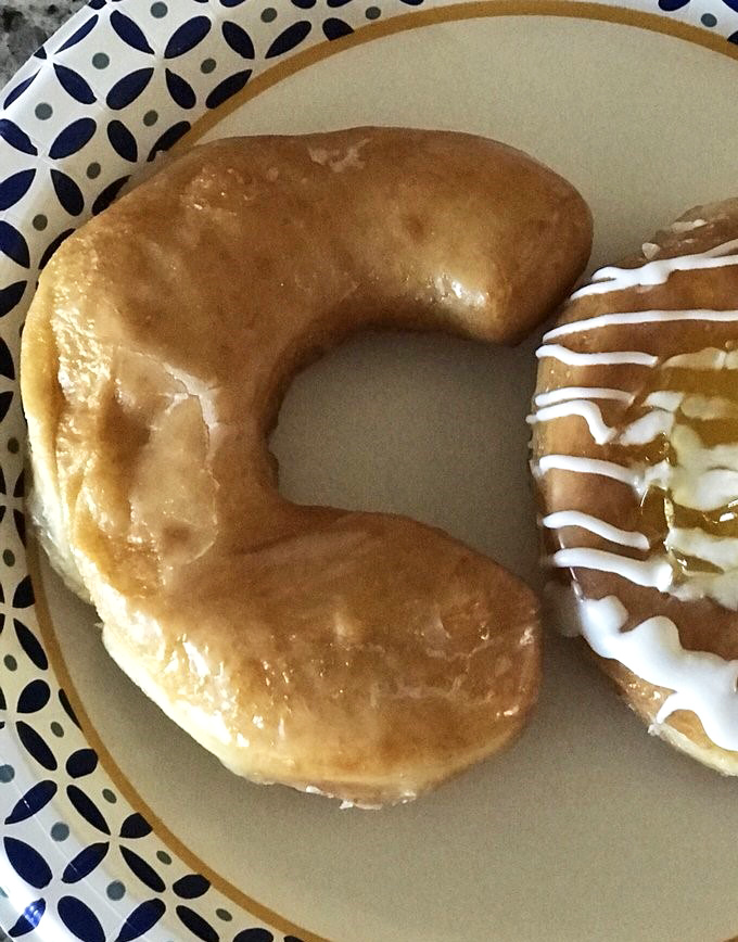 Holy horseshoes, Batman! This glazed beauty is shaped like good luck and tastes like heaven. It's a donut that really knows how to stirrup your appetite.