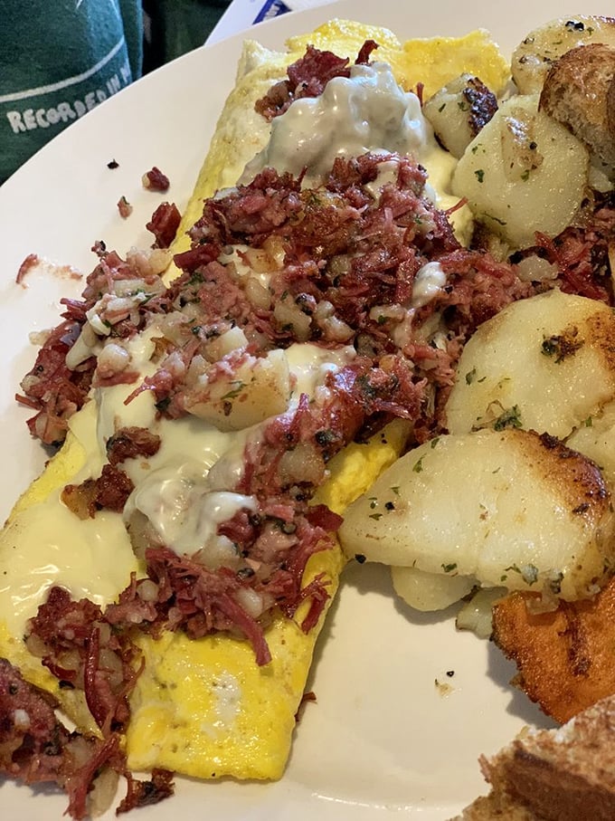 Omelette overload! This eggy masterpiece is so stuffed with goodies, it's practically the Thanksgiving turkey of breakfast dishes.