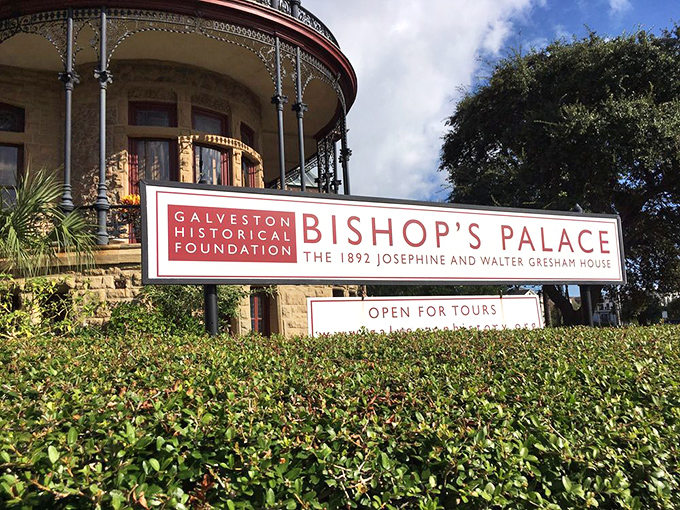 "Step right up, folks! History's waiting and it's got curb appeal." The welcoming sign invites visitors to explore this Galveston gem.