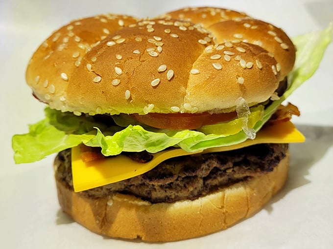 Hold onto your hats, folks! This burger's big enough to feed a cowboy posse. Giddy up and dig in!