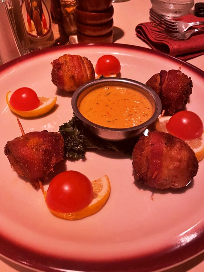 Bacon-wrapped bites of heaven! These scallops are so tempting, you might forget your table manners and lick the plate.