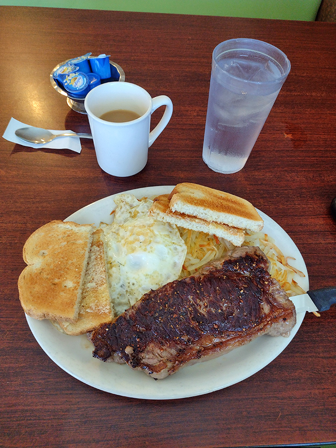 Breakfast of champions or dinner of kings? This plate proves The Rusted Spoon doesn't believe in culinary boundaries. Steak for breakfast? Don't mind if I do!