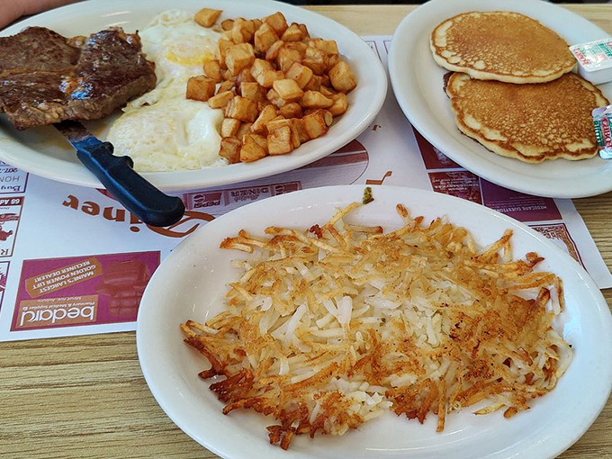 The breakfast of champions... and anyone else who loves a good feast! This plate is so loaded, it could probably bench press your morning coffee.