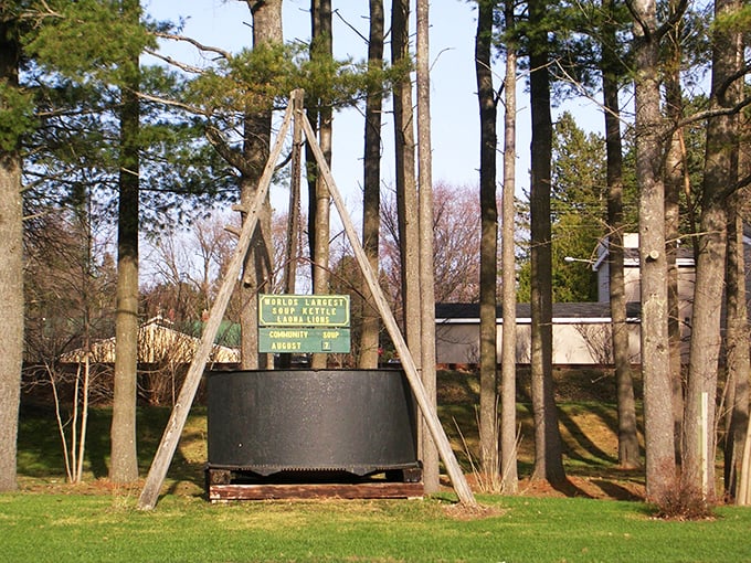 A picnic table for giants? Nope, just Wisconsin's quirkiest soup server nestled in a grove that screams "fairytale picnic spot."