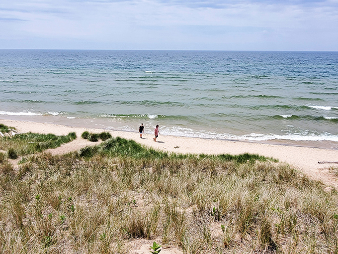 Beach strollers or time travelers? These folks look ready to star in their own "Baywatch: 1950s Edition."