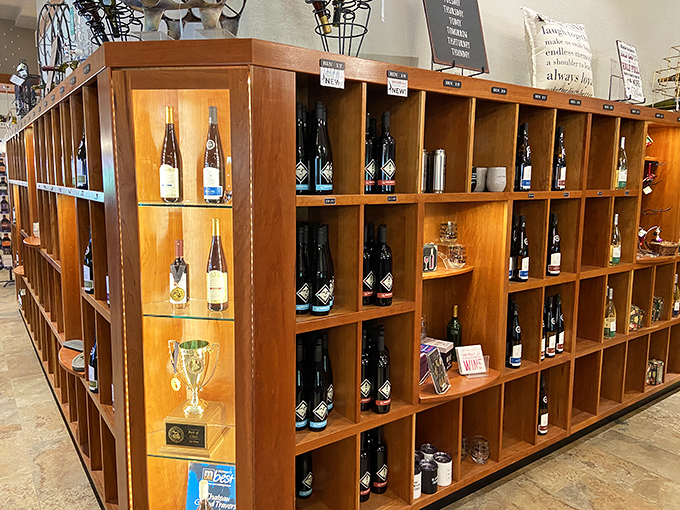 Wooden cubbies cradle liquid treasures, each bottle a story waiting to be uncorked. It's like a library, but way more fun.