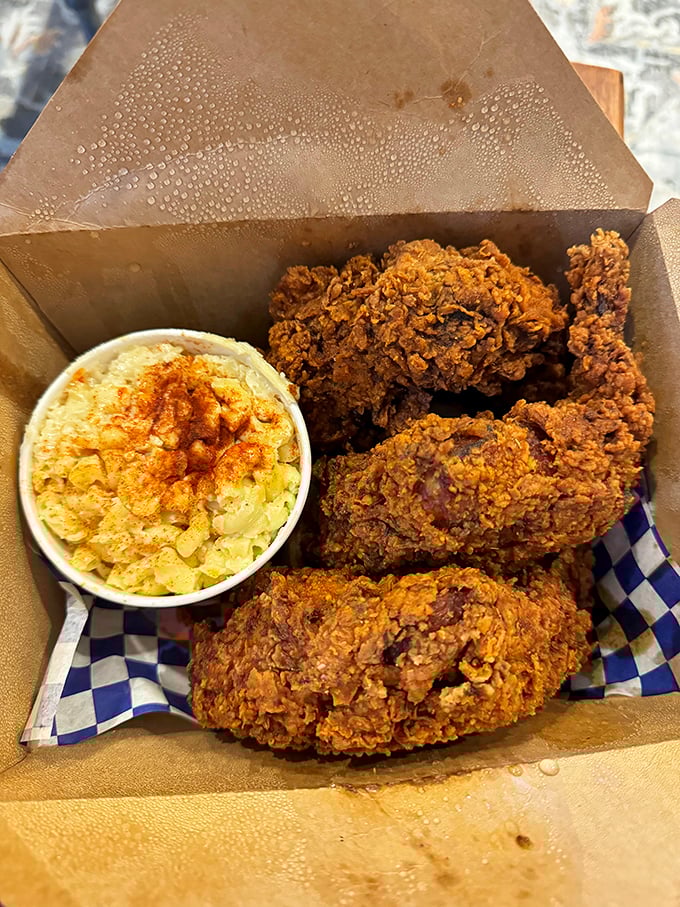 Golden-brown perfection meets mac and cheese heaven. It's like the chicken and the side dish had a delicious family reunion on your plate.