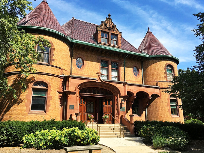 Dawes House: "Red brick elegance with a lake view! It's like Downton Abbey decided to take a lakeside vacation in the Midwest."