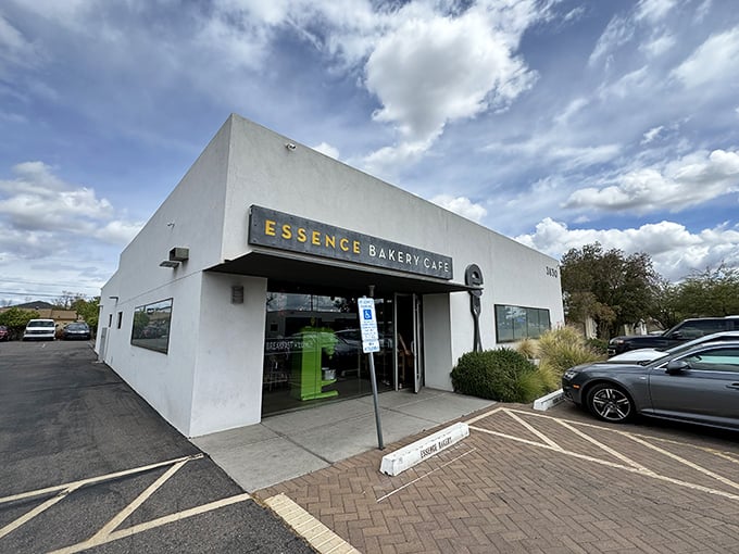 Essence Bakery Caf&eacute;: Where pastries get the red-carpet treatment. This sleek exterior promises a Hollywood premiere for your taste buds.