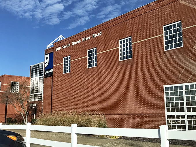 Goodwill's glass palace of possibilities. It's like a fun house mirror, reflecting endless bargains instead of wacky proportions.