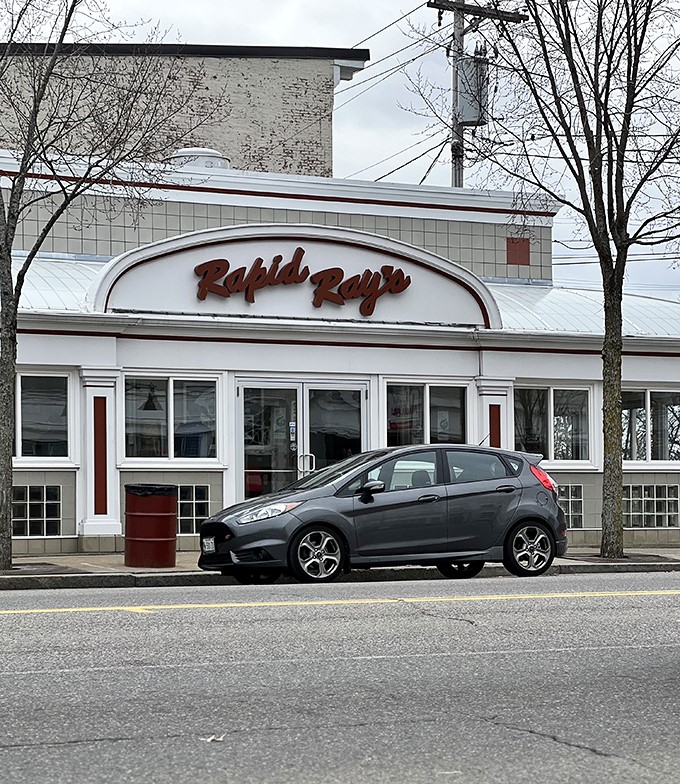 Rapid Ray's: Where retro meets delicious! This 1950s time machine serves up foot-long dogs that'll transport your taste buds to flavor town.