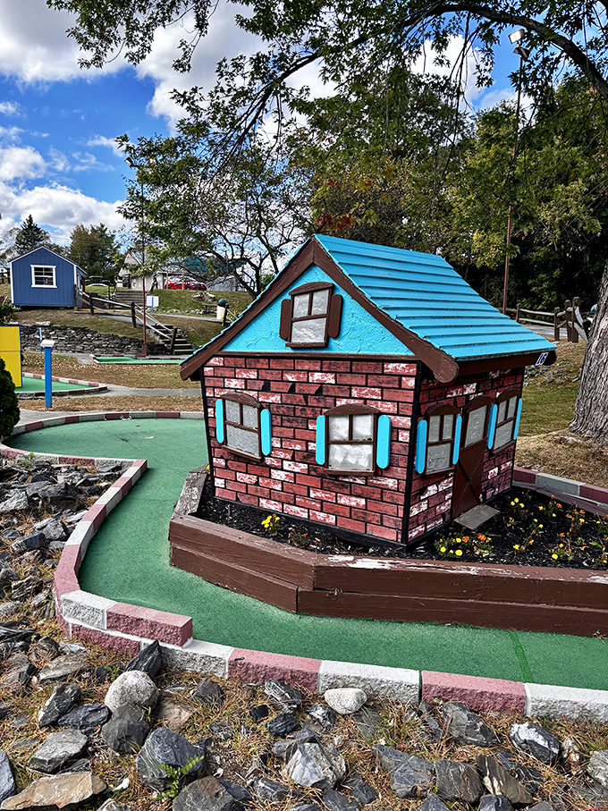 Home sweet mini-home! Putt your way through a quaint village that's more charming than a Norman Rockwell painting come to life.
