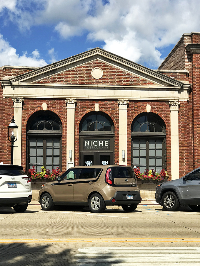Arched windows and classic brick? Niche looks like it could've starred in "Downton Abbey: Midwest Edition."