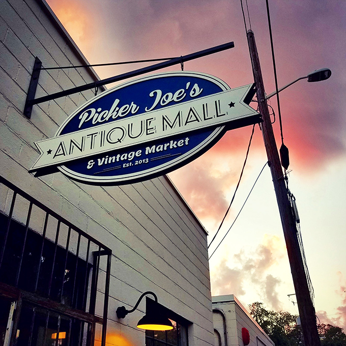 "Sunset or sunrise? Either way, Picker Joe's sign beckons treasure hunters to embark on a vintage adventure."