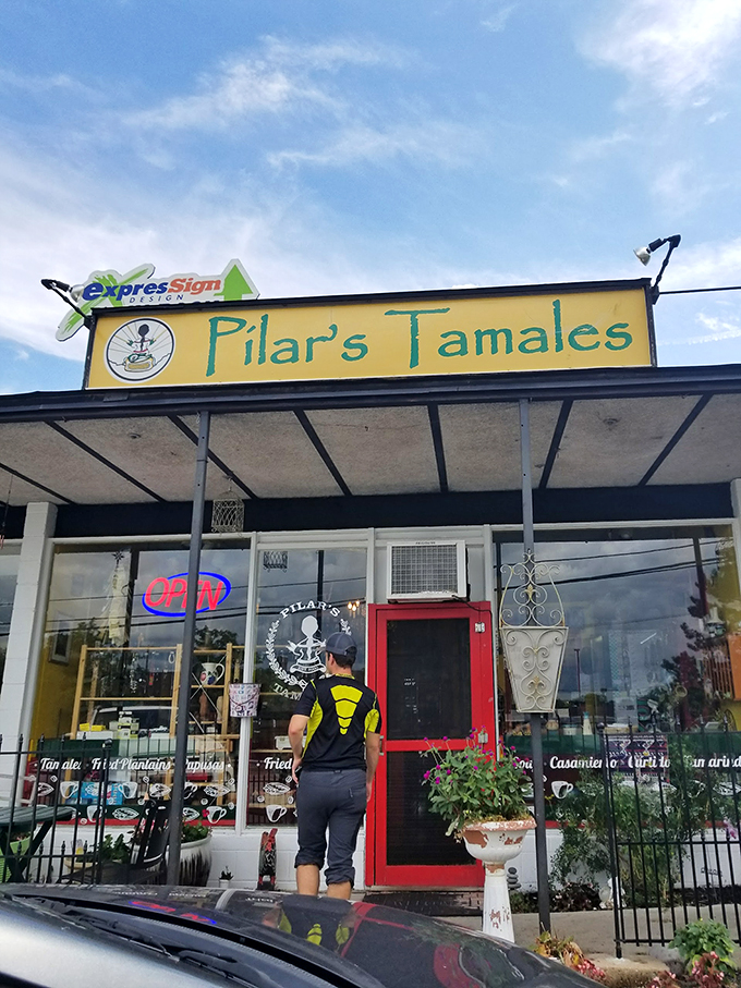 Tamale temptation station! Pilar's storefront is like a siren call to hungry passersby, promising handheld happiness wrapped in corn husks.