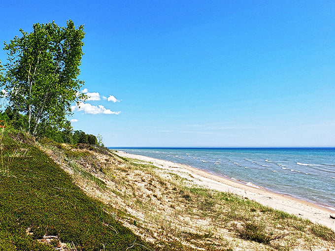 Rawley Point Lighthouse stands tall, guiding ships and selfie-takers alike. It's been #LighthouseLife since before hashtags were cool.