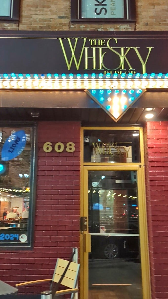 Lights, camera, libation! The Whisky Parlor's marquee promises a star-studded cast of spirits. Ready for your close-up with a classic cocktail?