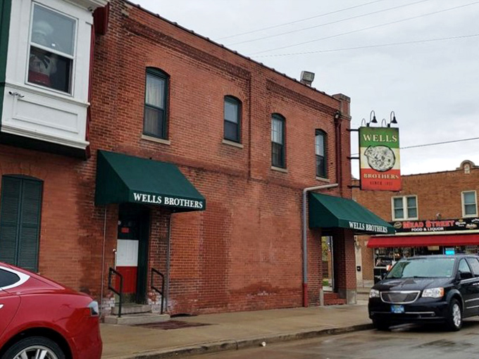 Brick by delicious brick! Wells Brothers' classic facade is like a treasure chest, hiding cheesy gold within its time-worn walls.