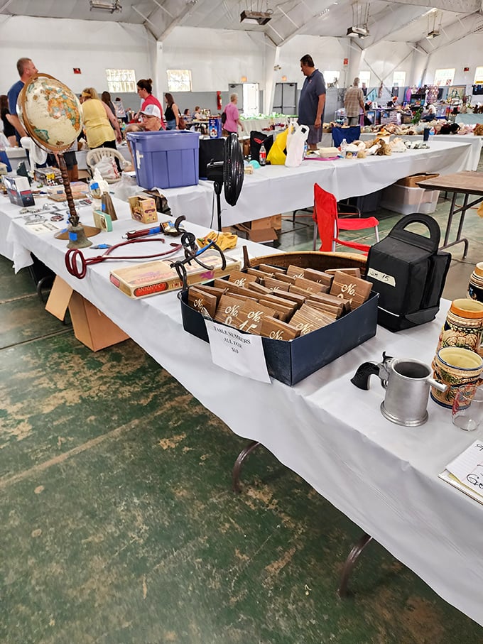 Nostalgia overload! This table is like your grandma's attic, but with price tags. From globes to tchotchkes, it's a trip down memory lane without the dust.