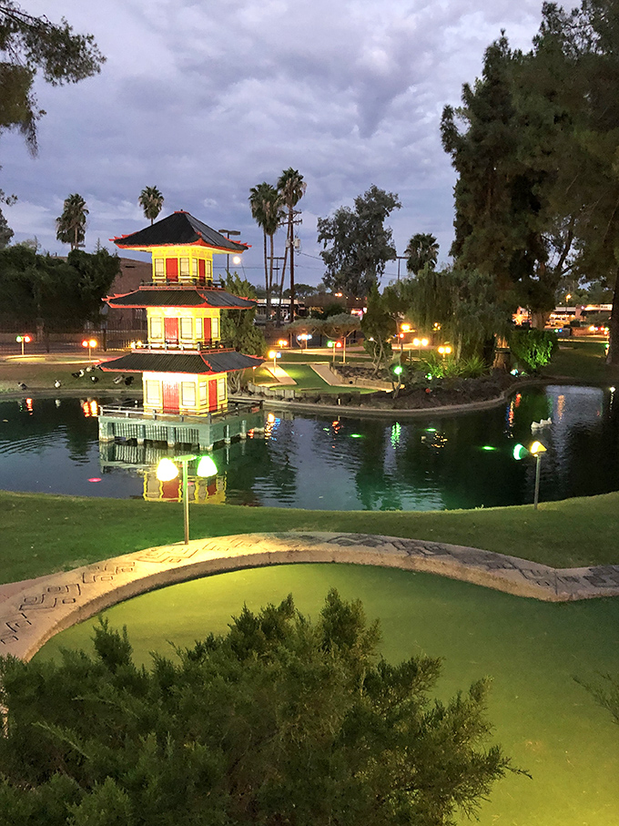 Night falls, but the fun's just beginning! This illuminated pagoda transforms the course into a twinkling wonderland after dark.
