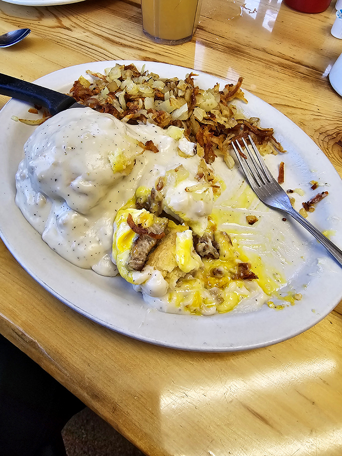 Comfort food alert! This plate of biscuits and gravy is like a warm hug for your taste buds &ndash; Southern hospitality on a fork.